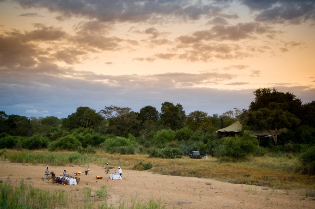 FOUR Magazine | Sunset-bush-dinner-at-andBeyond-Ngala-Tented-Camp
